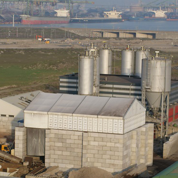 Industrial buildings - interlocking concrete blocks with steel roof ...
